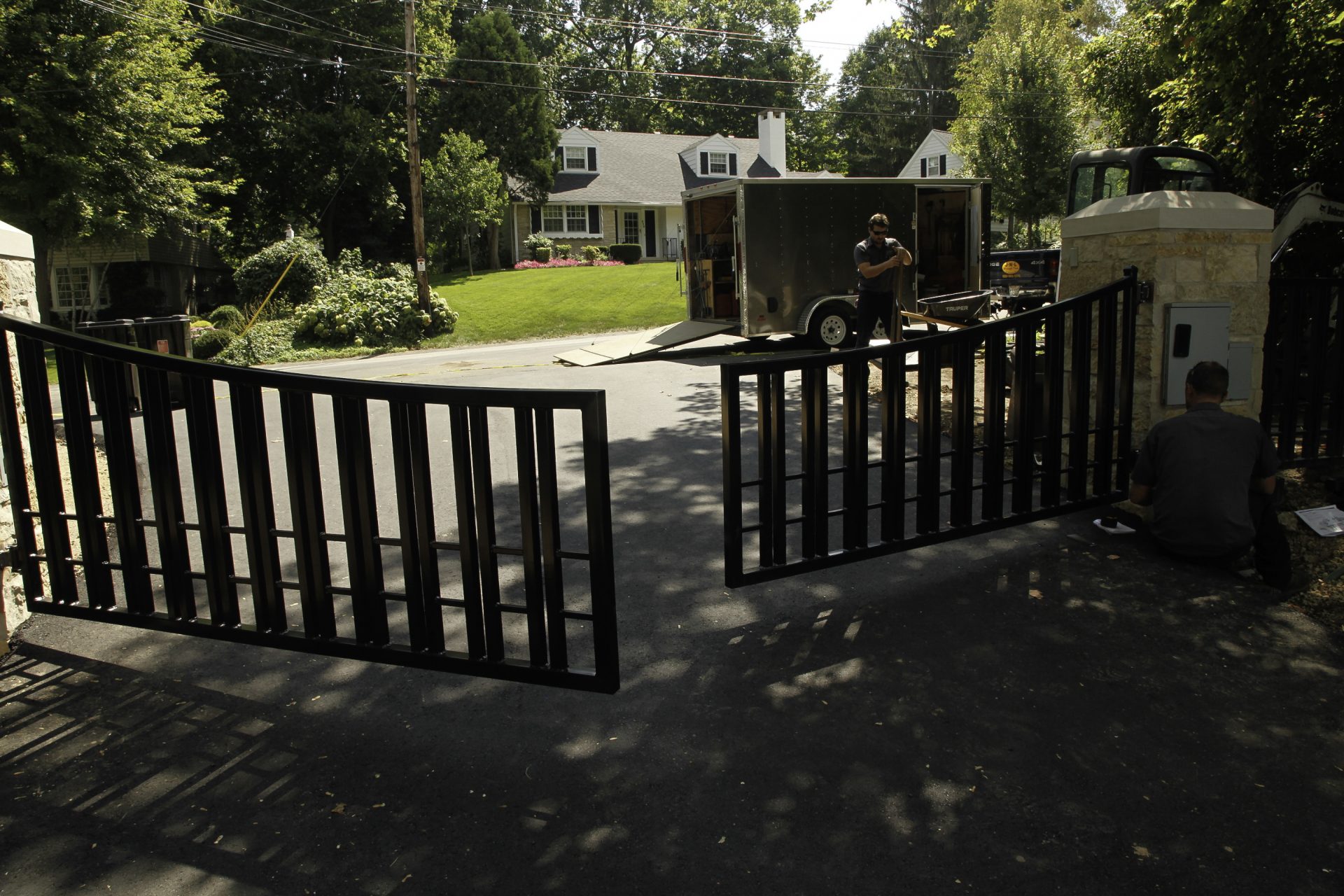 new-wrought-iron-gate-installation-with-power-opener - Gate Opener Systems