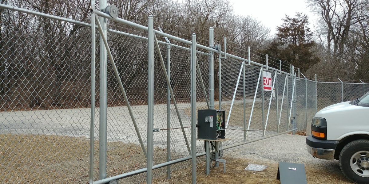 Service truck at gate - Gate Opener Systems